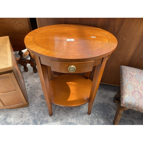 AN OVAL CHERRY SELVA STYLE INTERNATIONAL SIDE TABLE WITH SINGLE DRAWER ...
