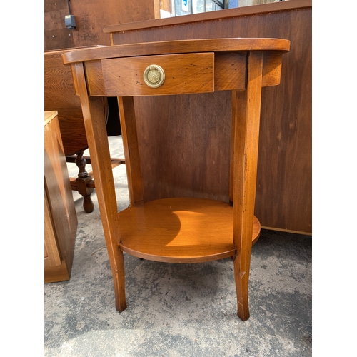 AN OVAL CHERRY SELVA STYLE INTERNATIONAL SIDE TABLE WITH SINGLE DRAWER ...