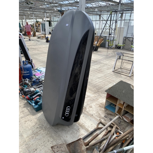 AN AUDI ROOF BOX WITH BARS