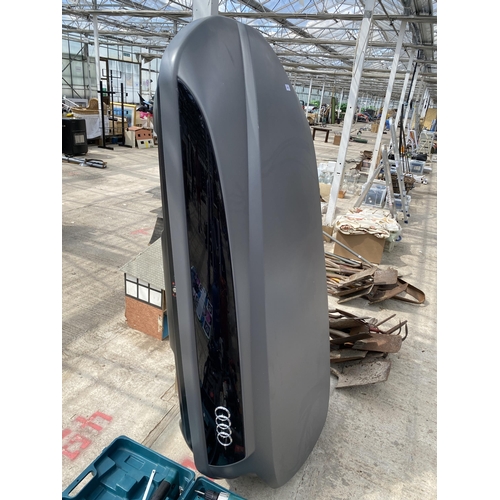 AN AUDI ROOF BOX WITH BARS