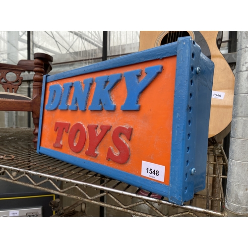 AN ILLUMINATED DINKY TOYS SIGN