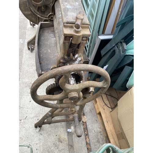 A VINTAGE MANGLE WITH CAST IRON BASE