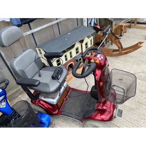 A SHOPRIDER DELUXE MOBILITY SCOOTER WITH KEY AND CHARGER AND BELIEVED ...