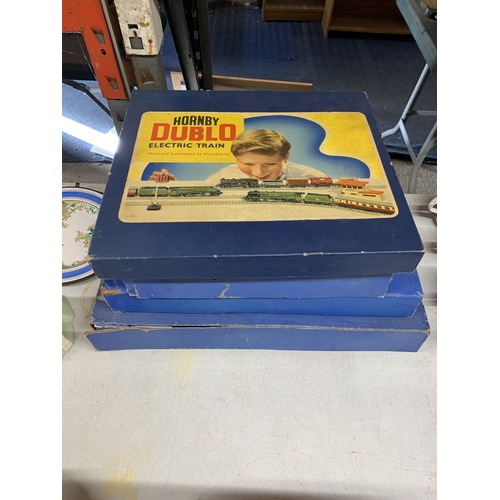 FOUR EARLY EMPTY HORNBY DUBLO BOXES WITH INTERNAL FITTINGS