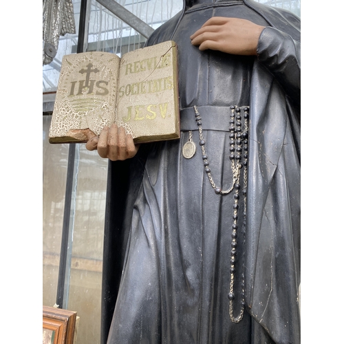 A LARGE LATE 19TH / EARLY 20TH CENTURY PLASTER FIGURE OF A PRIEST ON A ...