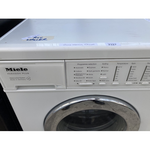 A WHITE MIELE PARAGON PLUS WASHING MACHINE