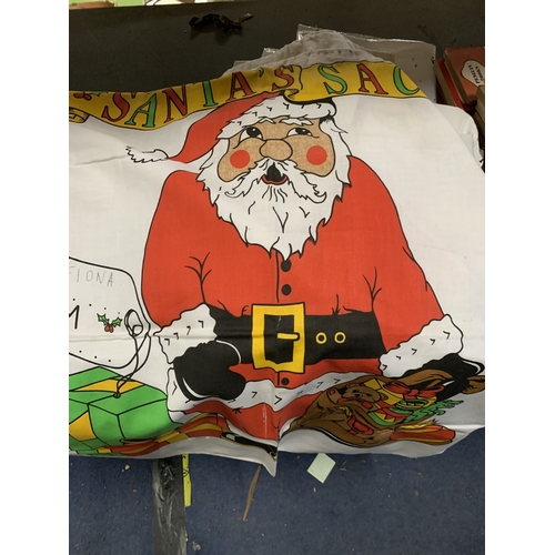 SIX VINTAGE CLOTH SANTA SACKS 30"x24", A HUGE DISNEY BAG AND FIVE FABRIC SANTA BAGS 32"x21"