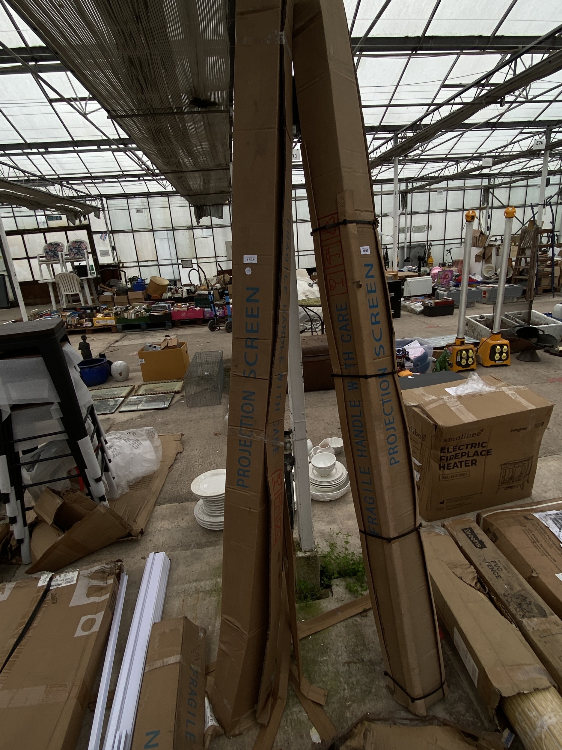 A BOXED PROJECTOR SCREEN