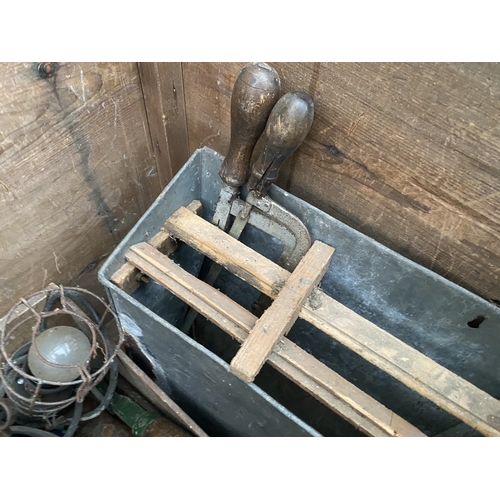 A LARGE VINTAGE PINE JOINERS CHEST COMPLETE WITH VARIOUS TOOLS