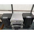 A TECHNICS STACKING STEREO SYSTEM WITH TWO SPEAKERS
