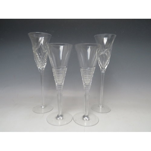 TWO STUART CRYSTAL STRATA PATTERN CHAMPAGNE FLUTES DESIGNED BY JASPER ...