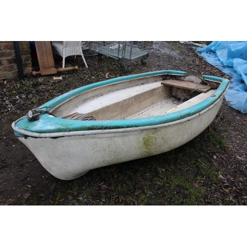A FIBREGLASS ROWING BOAT