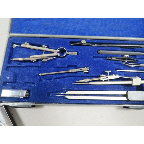 Four cased technical drawing sets