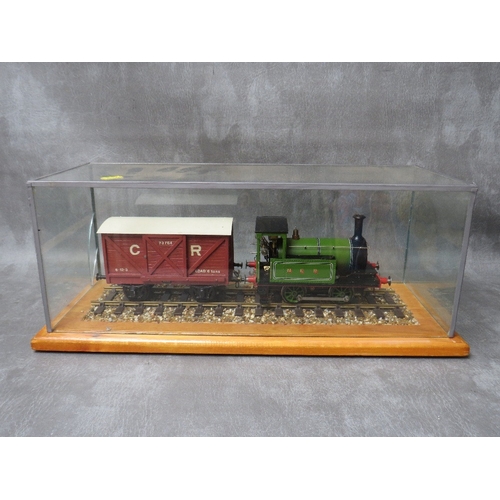 O GAUGE NER STEAM LOCOMOTIVE AND PIECE OF ROLLING STOCK, mounted on ...