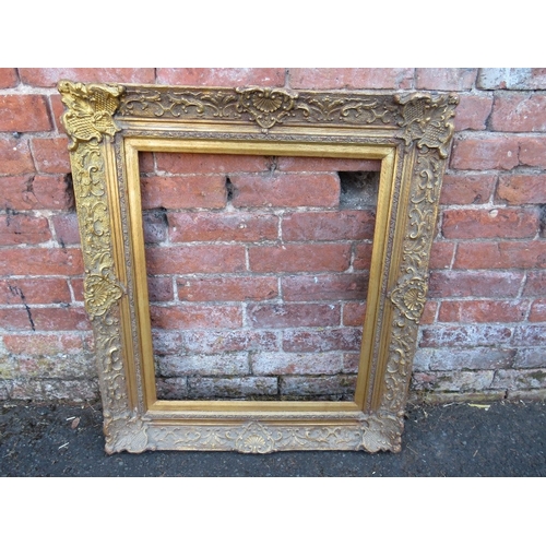 A 19TH CENTURY GILT PICTURE FRAME WITH ACANTHUS MOULDED DETAIL, overall ...