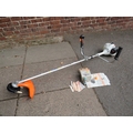 A Stihl FS 56C petrol brush cutter with additional wire strimmer head ...
