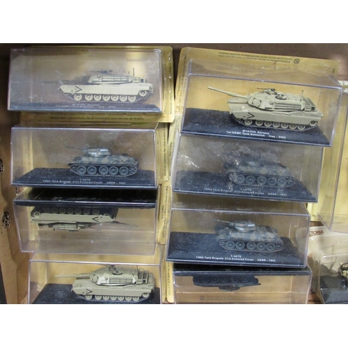 A box of model diecast tanks