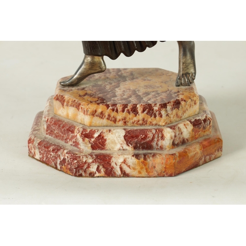 LUCILLE SEVIN. AN ART DECO SILVERED AND PATINATED BRONZE SCULPTURE OF A ...