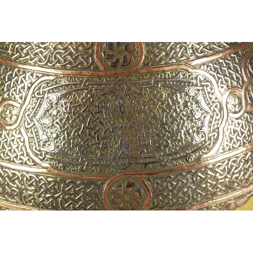 A 19TH CENTURY MIDDLE EASTERN ISLAMIC CAIRO-WARE BRASS BOWL profusely ...