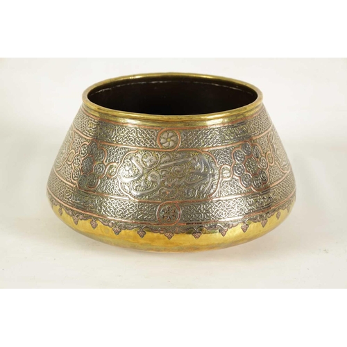 A 19TH CENTURY MIDDLE EASTERN ISLAMIC CAIRO-WARE BRASS BOWL profusely ...