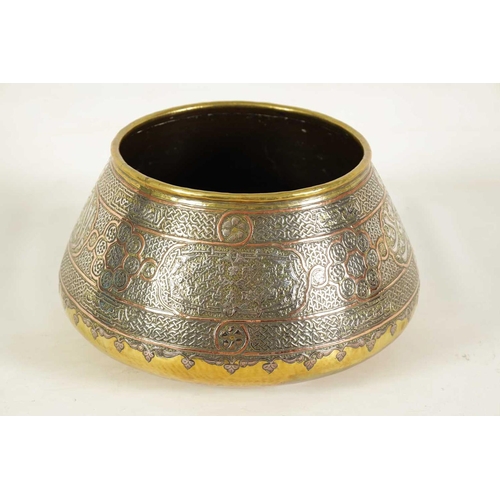 A 19TH CENTURY MIDDLE EASTERN ISLAMIC CAIRO-WARE BRASS BOWL profusely ...