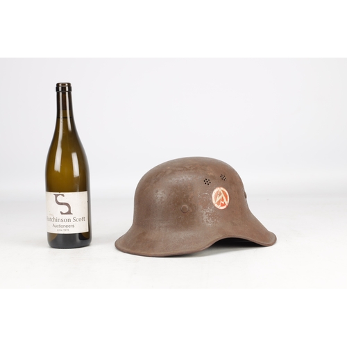 A WWII GERMAN SA STEEL CIVIC HELMET of M34 gladiator pattern with ...