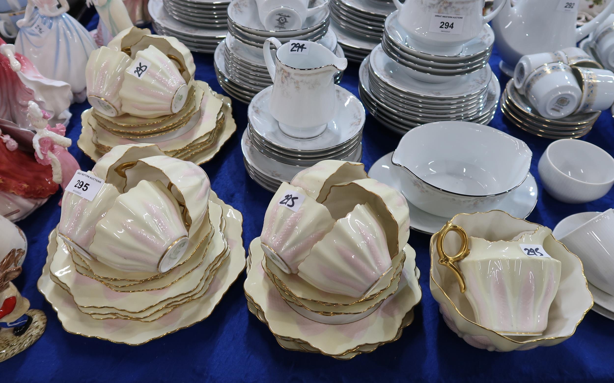 A Paragon china teaset, circa 1912, the fluted shape with ye ...