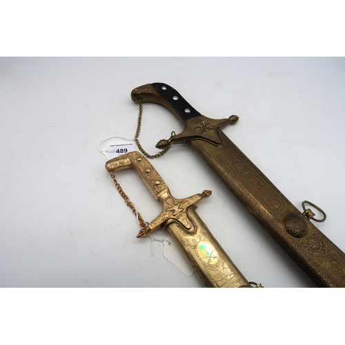 Two decorative mameluke-type sabres, each bearing Saudi Arabian ...
