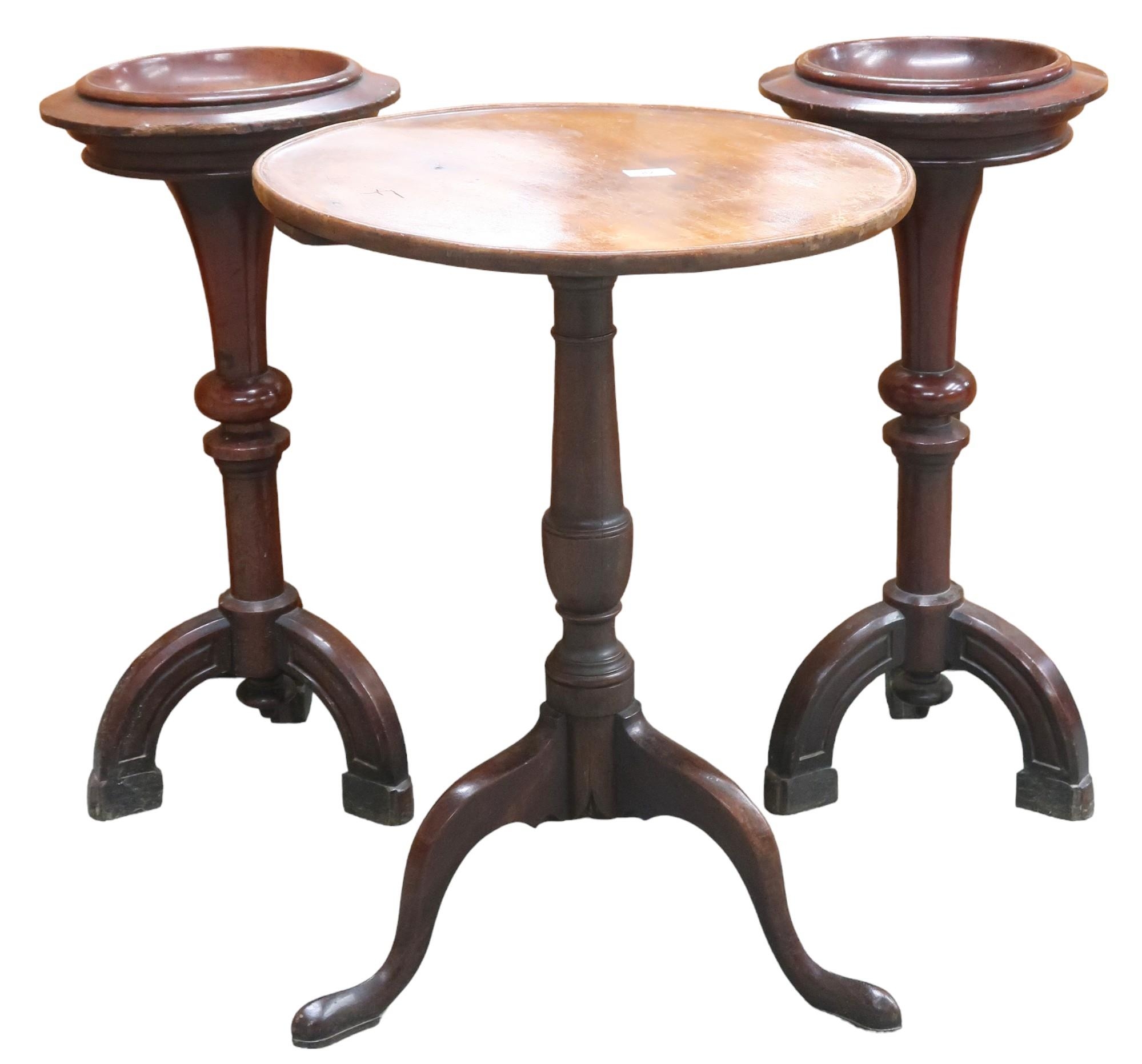 A lot comprising a pair of late Victorian mahogany church fonts on ...