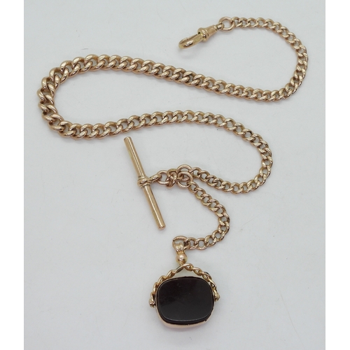 A 9ct rose gold tapered fob chain, with attached carnelian fob seal ...