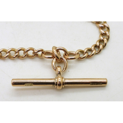 A 9ct rose gold tapered fob chain, with attached carnelian fob seal ...