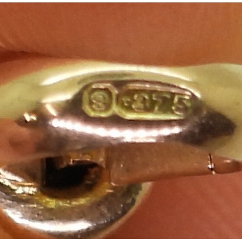 A 9ct rose gold tapered fob chain, with attached carnelian fob seal ...