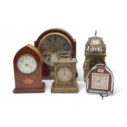 A collection of clocks including a lantern example