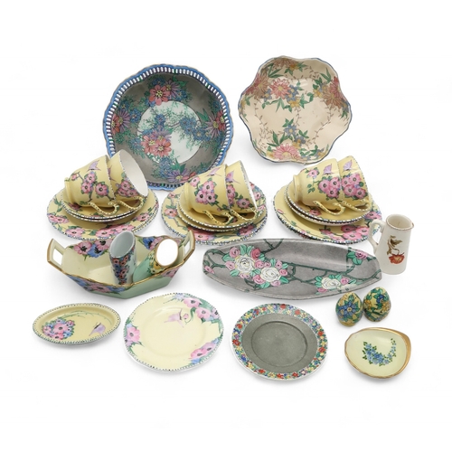 A MAY WILSON HAND PAINTED TEA SETcomprising six cups, saucers and ...