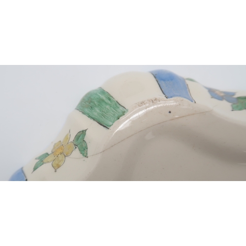 A MAY WILSON HAND PAINTED TEA SETcomprising six cups, saucers and ...