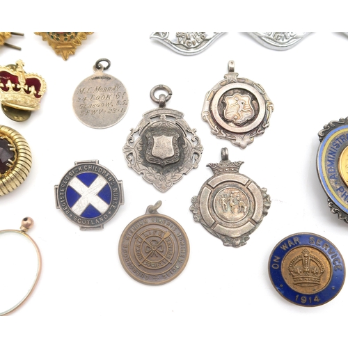 A 9ct gold-rimmed monocle; pair of Hiatt police handcuffs; assorted fob ...