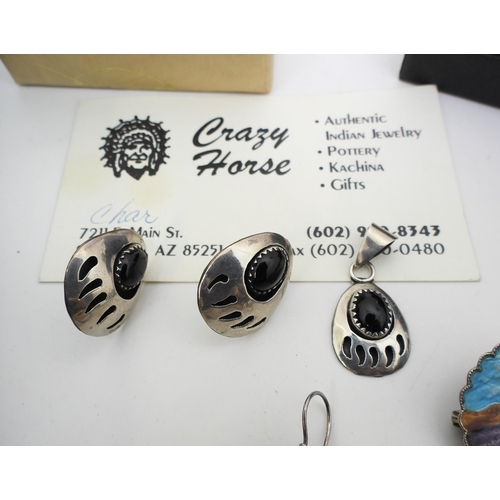 A pair of First Nation 'Bear's Paw' earrings and a pendant, stamped S.E ...