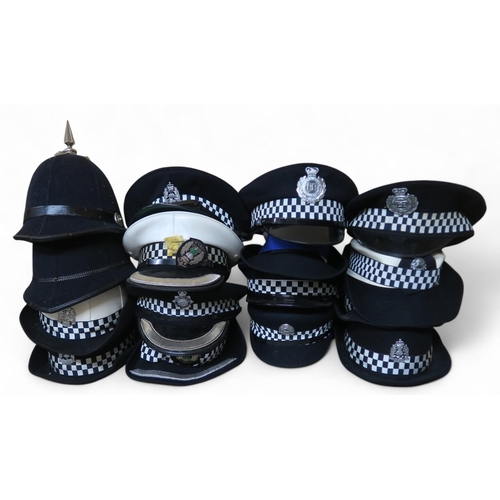 Assorted British police headwear, comprising male and female constable ...
