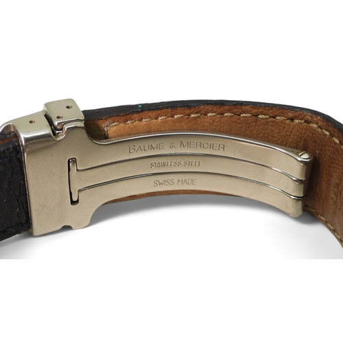 A BAUME & MERCIER AUTOMATICwith a two tone navy blue dial with silvered ...