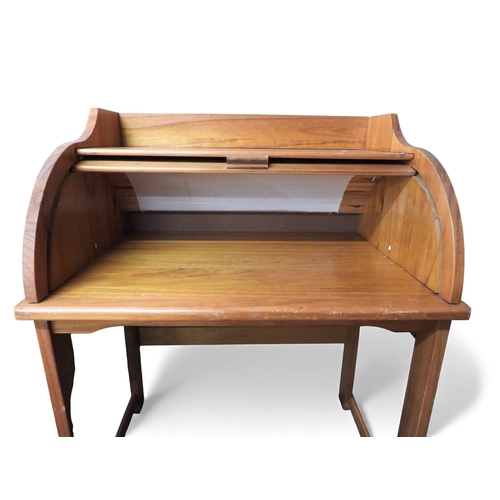 A contemporary pine tambour topped child's desk, 85cm high x 69cm wide ...