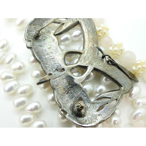 A silver Pat Cheney enamelled brooch, signed with the PC monogram ...