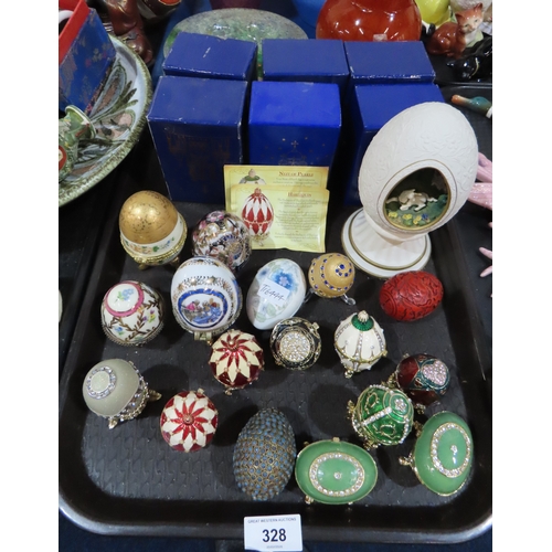 A group of Atlas Edition Faberge eggs including Glacier Lake, Nest of ...