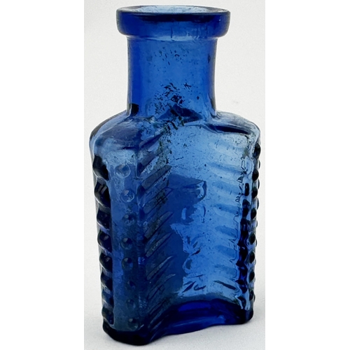 FOULSTONS CRESCENT POISON BOTTLE. (DP p57). 2.3ins tall. Cobalt blue ...