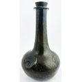ENGLISH SEALED SHAFT & GLOBE WINE BOTTLE. 9.2ins tall, c.1665. DB p985 ...