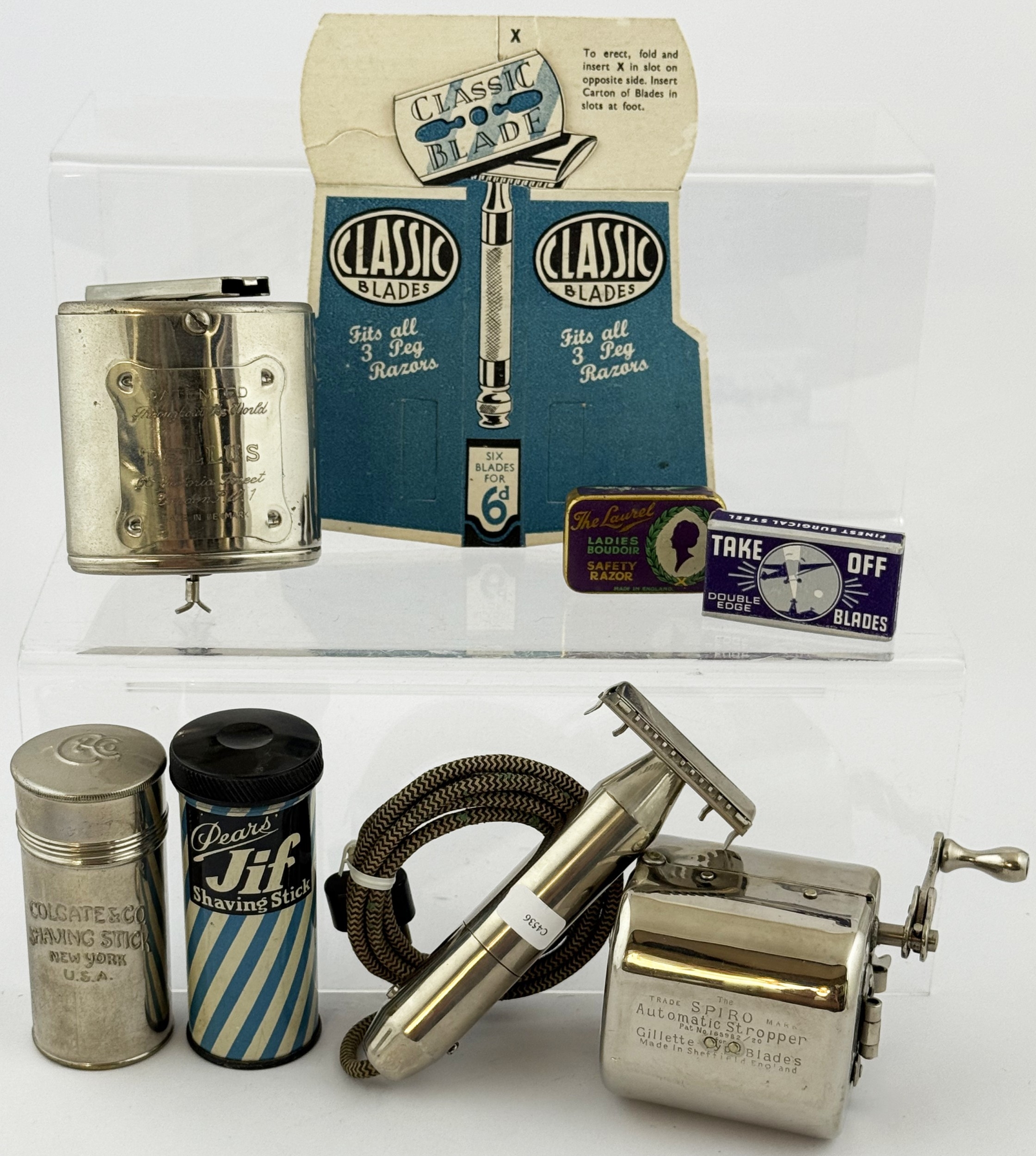 SHAVING GROUP. Plug in razor, boxed blades, shaving stick tubes, card ...