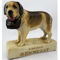 HENNESSY COGNAC FIGURE. 9.75ins tall. Rubberoid figure of dog with ...