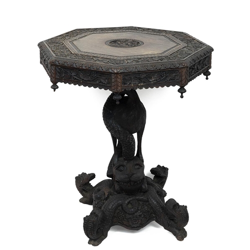 Antique Burmese table, profusely carved throughout. Hexagonal top with ...