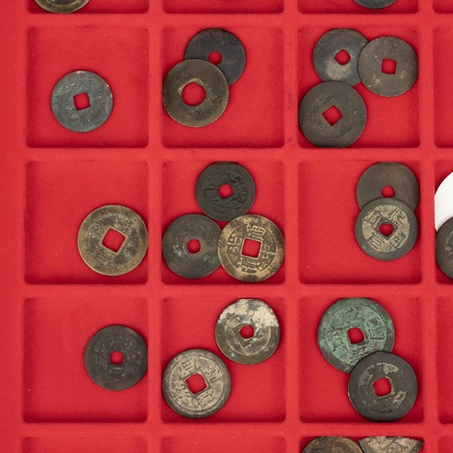Tray of Asian 'cash coins', including some from Vietnam as well as some ...