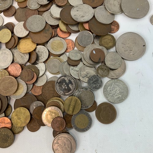 A collection of U.K. and world coinage, mostly 20th-century examples.