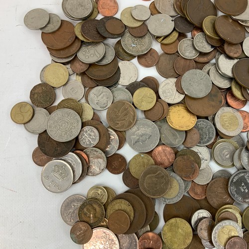 A collection of U.K. and world coinage, mostly 20th-century examples.